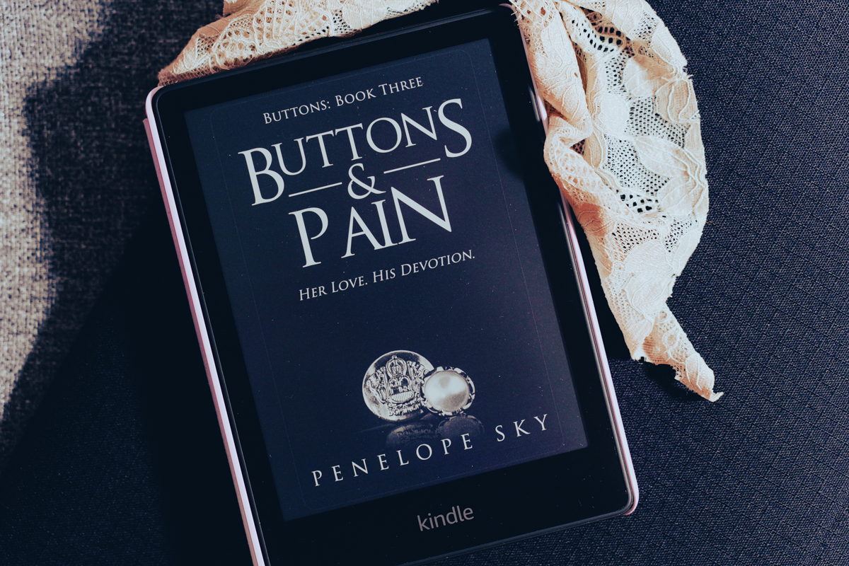 Book Review: Buttons & Pain – The Girl with The Red Backpack